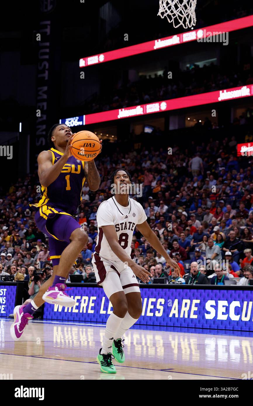 NASHVILLE, TN - MARCH 12: LSU Tigers guard Jordan Sears (1) drives in ...