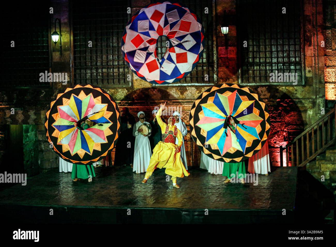 Cairo, Egypt. 12th Mar, 2025. Dancers perform Tanoura, a traditional ...