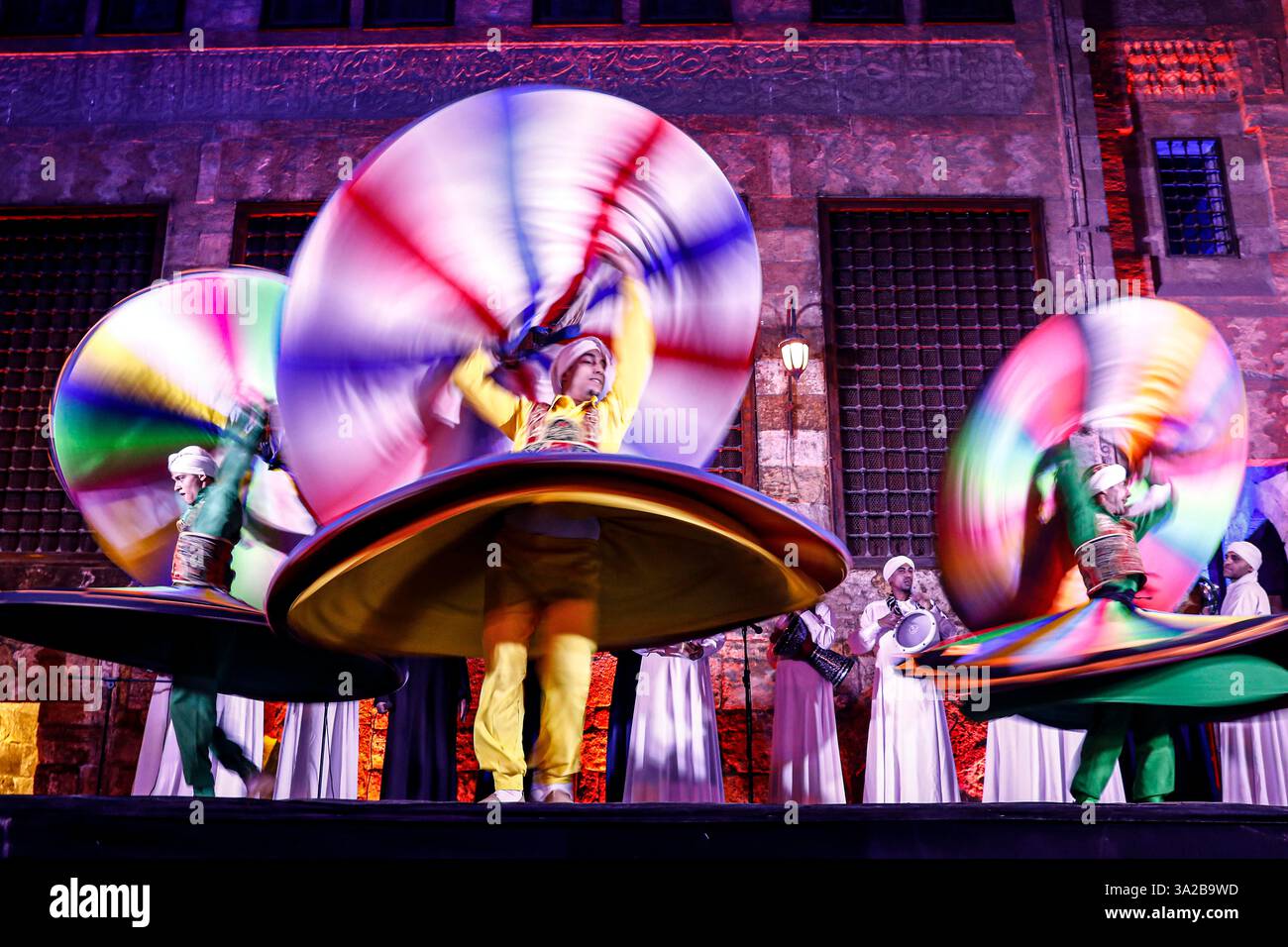 Cairo, Egypt. 12th Mar, 2025. Dancers perform Tanoura, a traditional ...