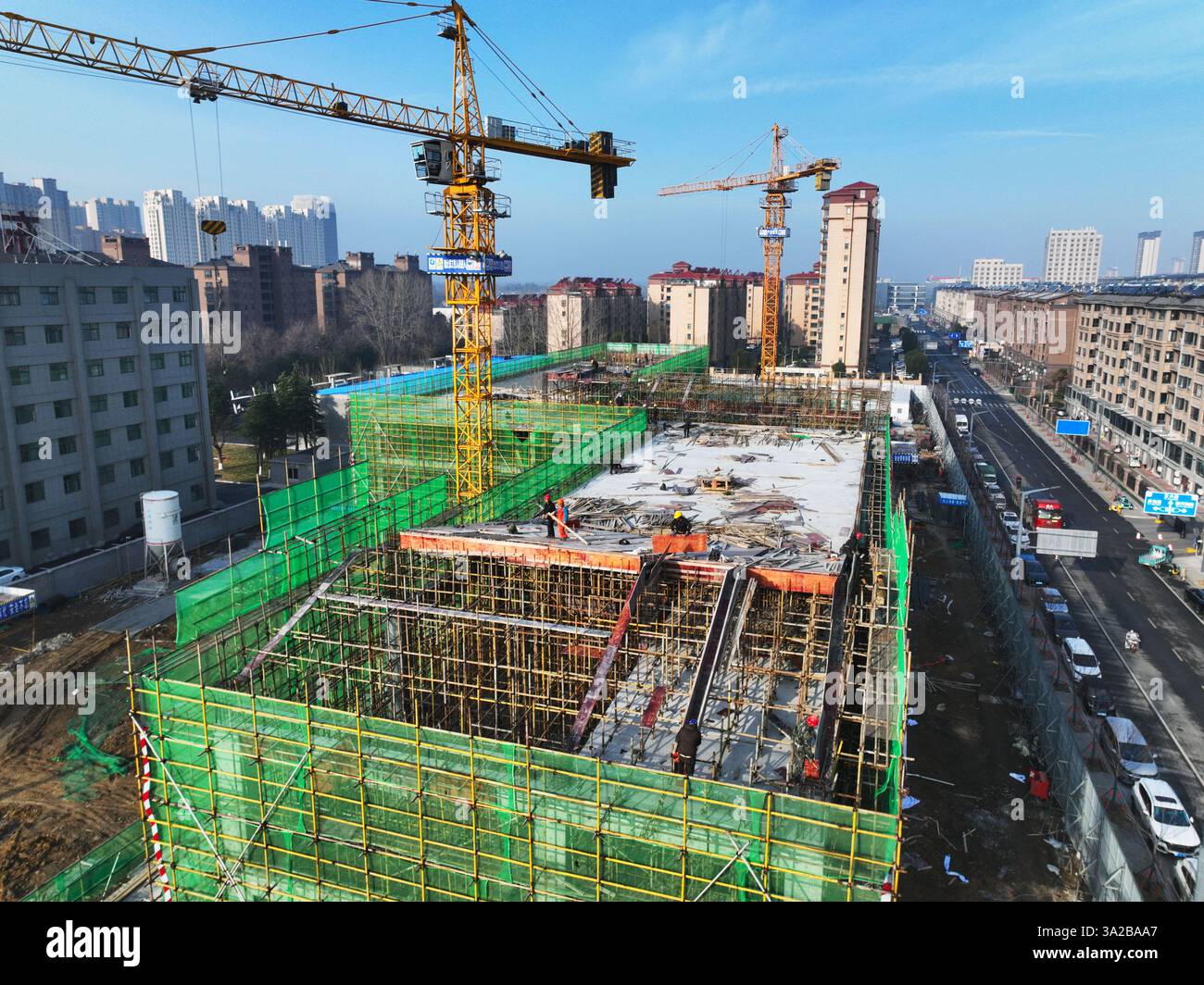 LIANYUNGANG, CHINA - MARCH 13, 2025 - Workers work at the construction ...