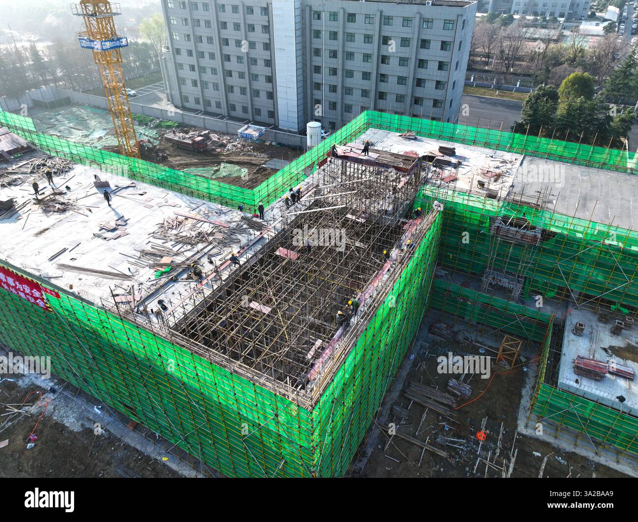 LIANYUNGANG, CHINA - MARCH 13, 2025 - Workers work at the construction ...