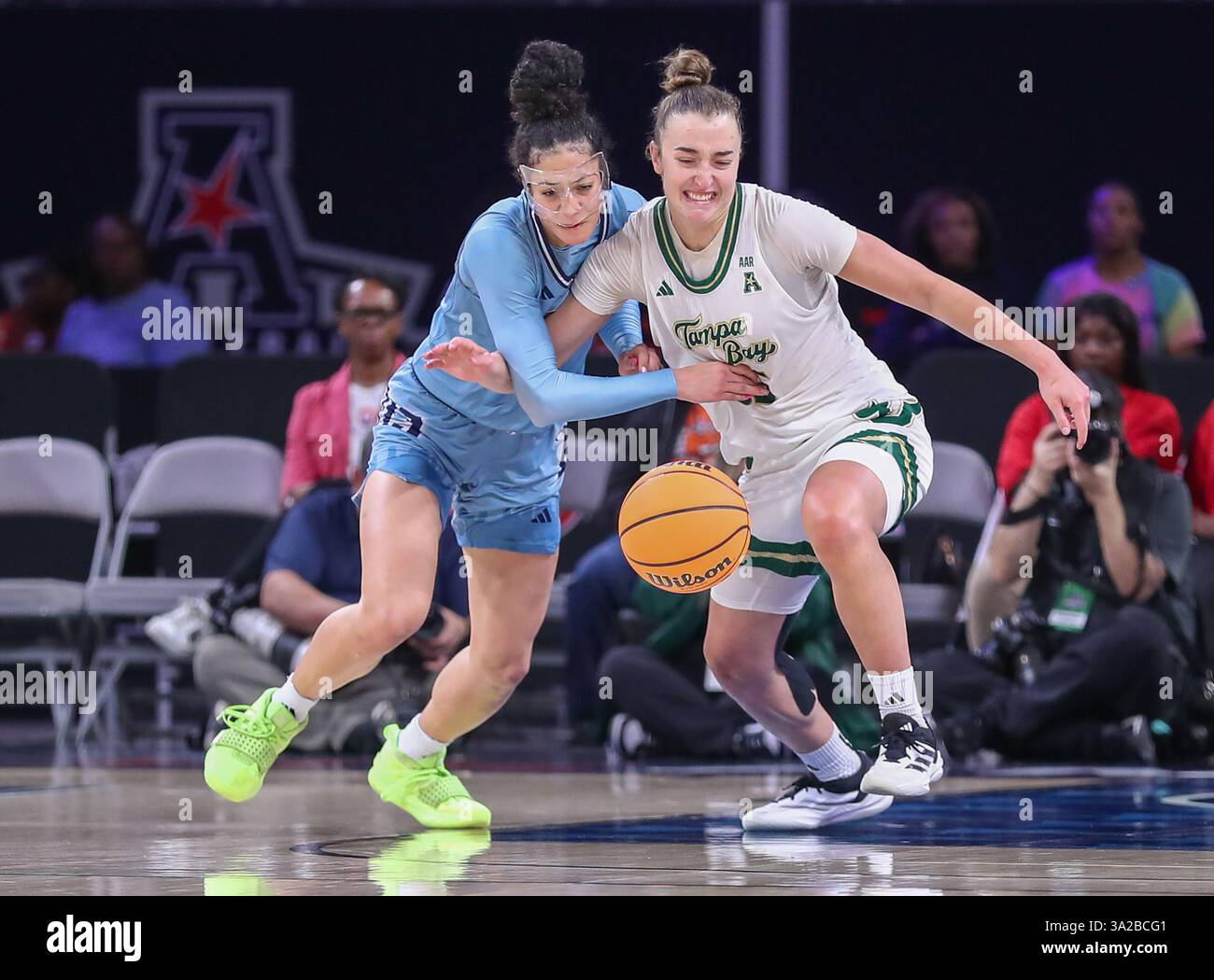 March 12, 2025, Fort Worth, Texas, USA: Riceâ€™s MALIA FISHER (1) and ...
