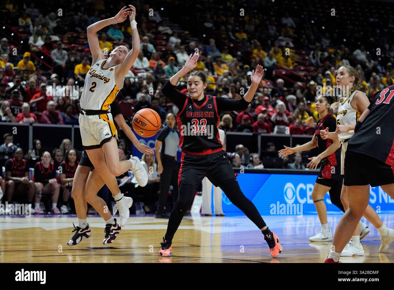 Wyoming guard Emily Mellema (2) has the ball knocked from her hands ...