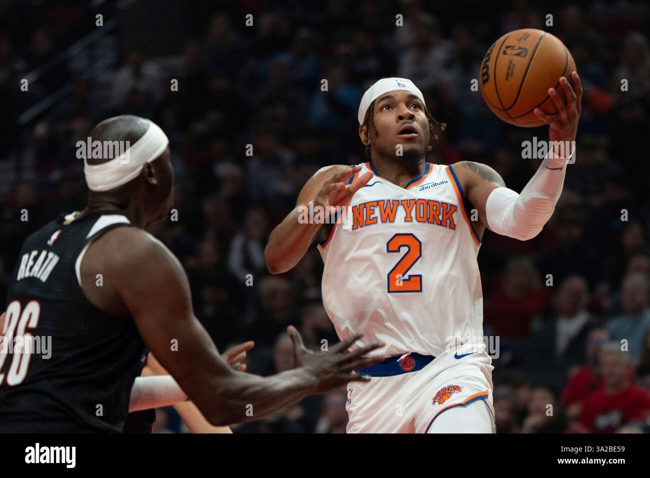 New York Knicks guard Miles McBride (2) goes to the basket as Portland ...