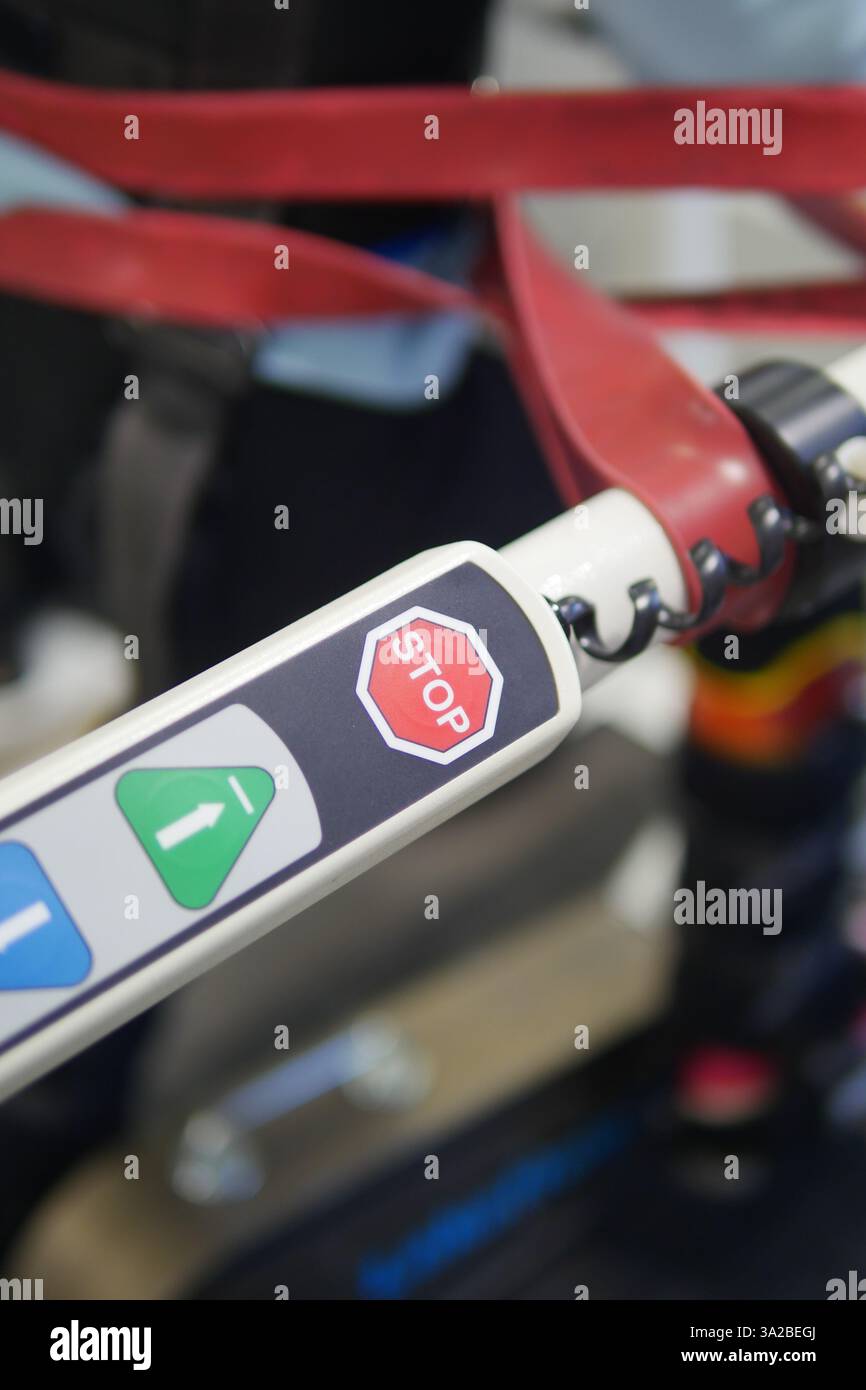 Control panel of a mobility device showing stop button and icons Stock ...