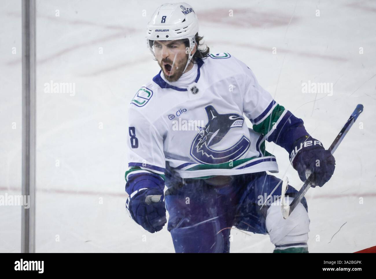 Vancouver Canucks' Conor Garland celebrates his shootout goal during ...