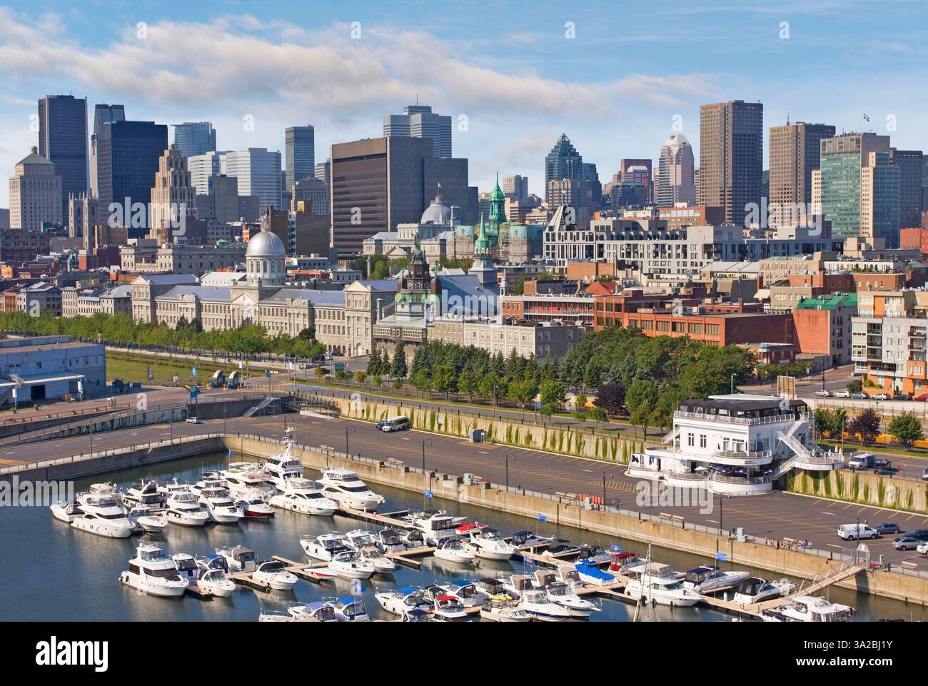 Aerial view of Montreal skyline in summer with yachts port in the ...