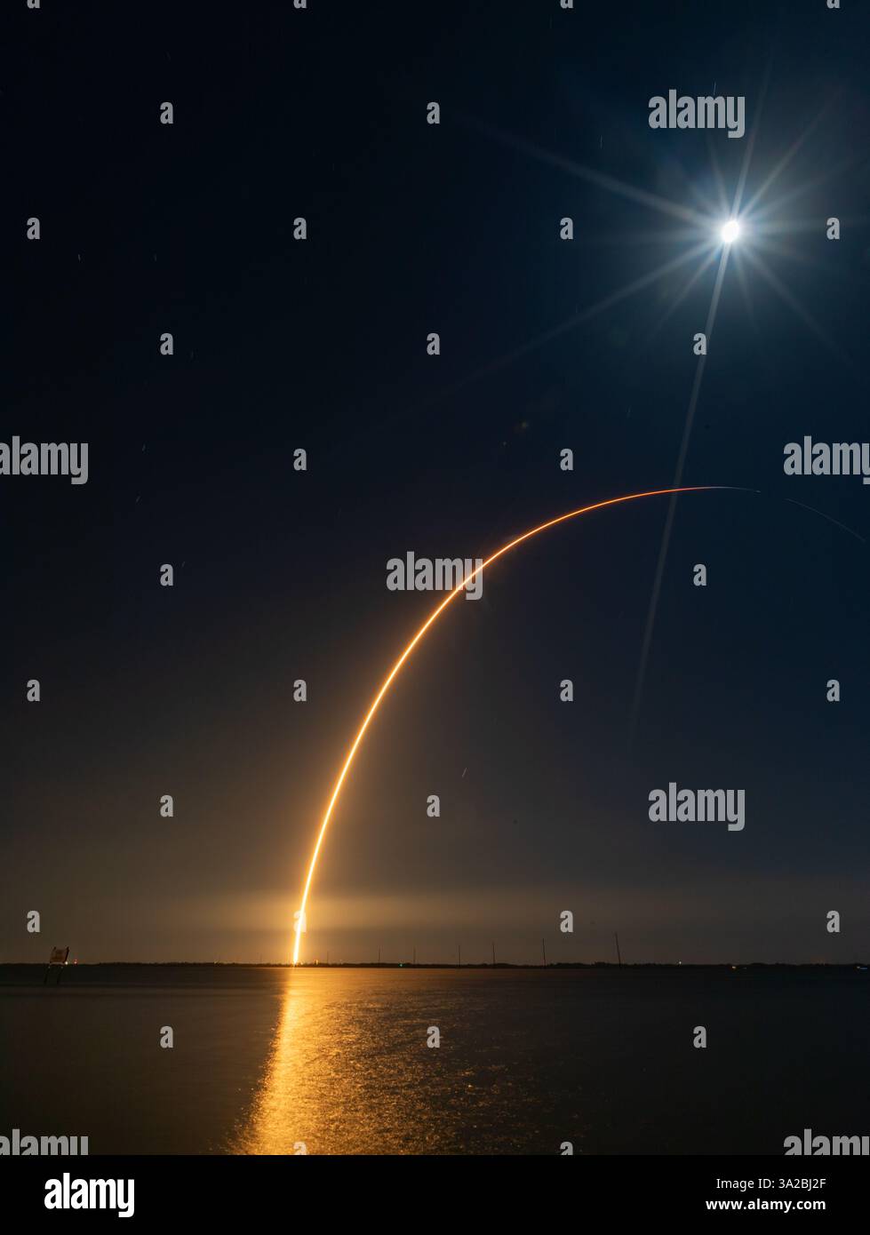 On a clear moon lite evening SpaceX launched Falcon 9 Starlink 12-21 ...