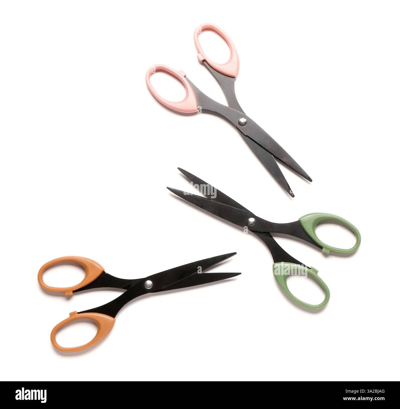 Colorful scissors on white background Stock Photo - Alamy