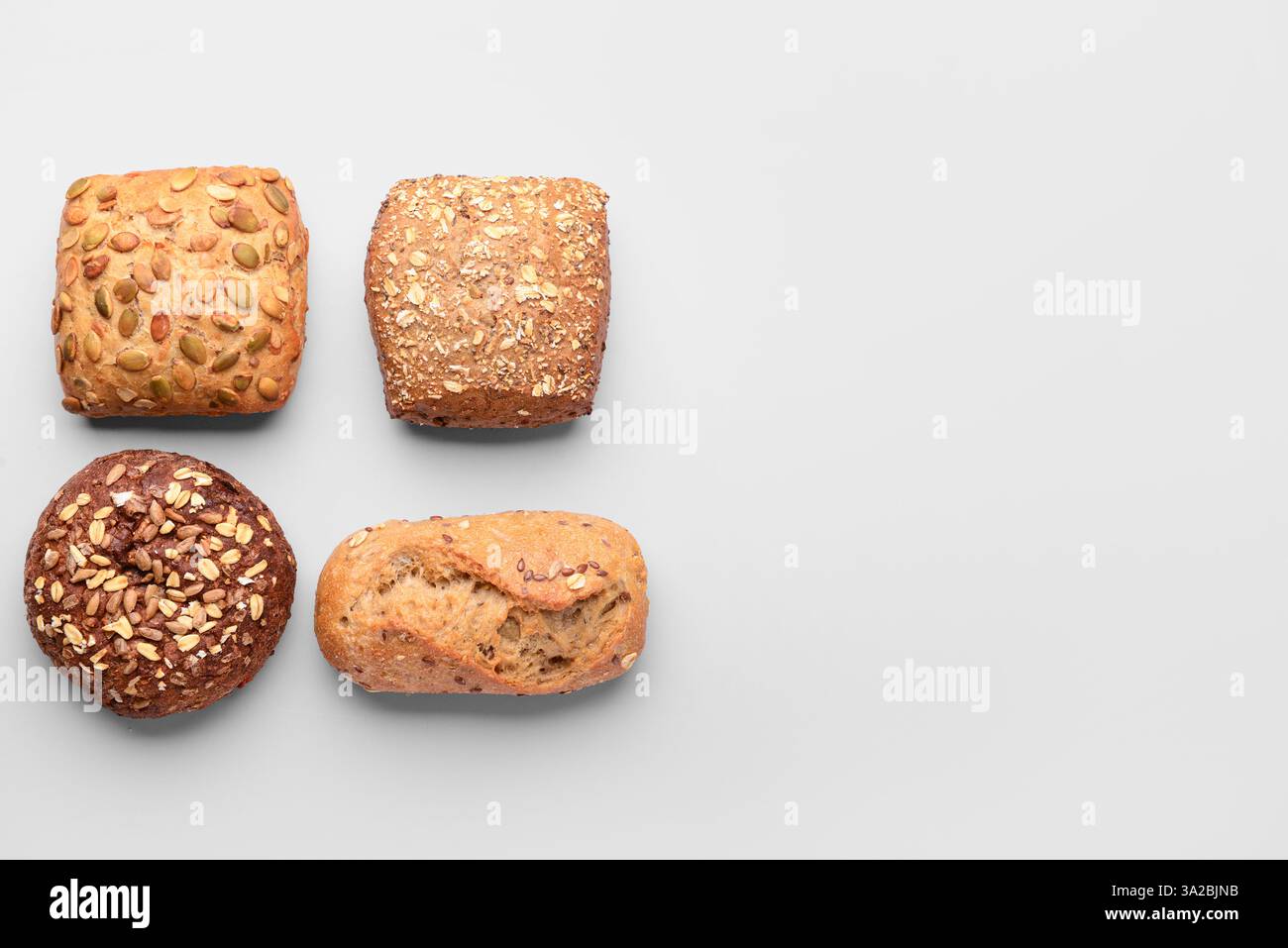 Different delicious buns on white background Stock Photo - Alamy