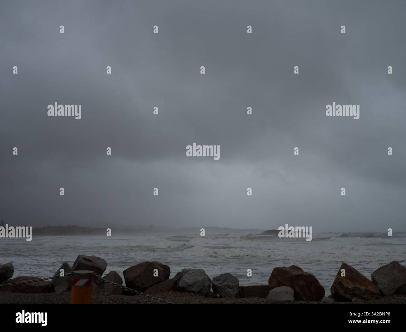 Stormy sea waves crashing and wild windy weather caused by the edge of ...