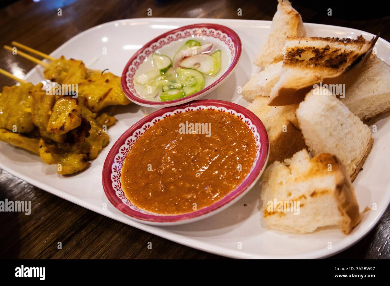 Thai food fusion style cuisine grilled Moo Satay or roasted pork satay ...