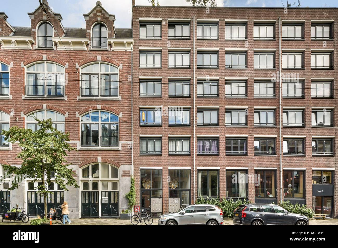 A striking contrast of modern and historic architectural styles ...