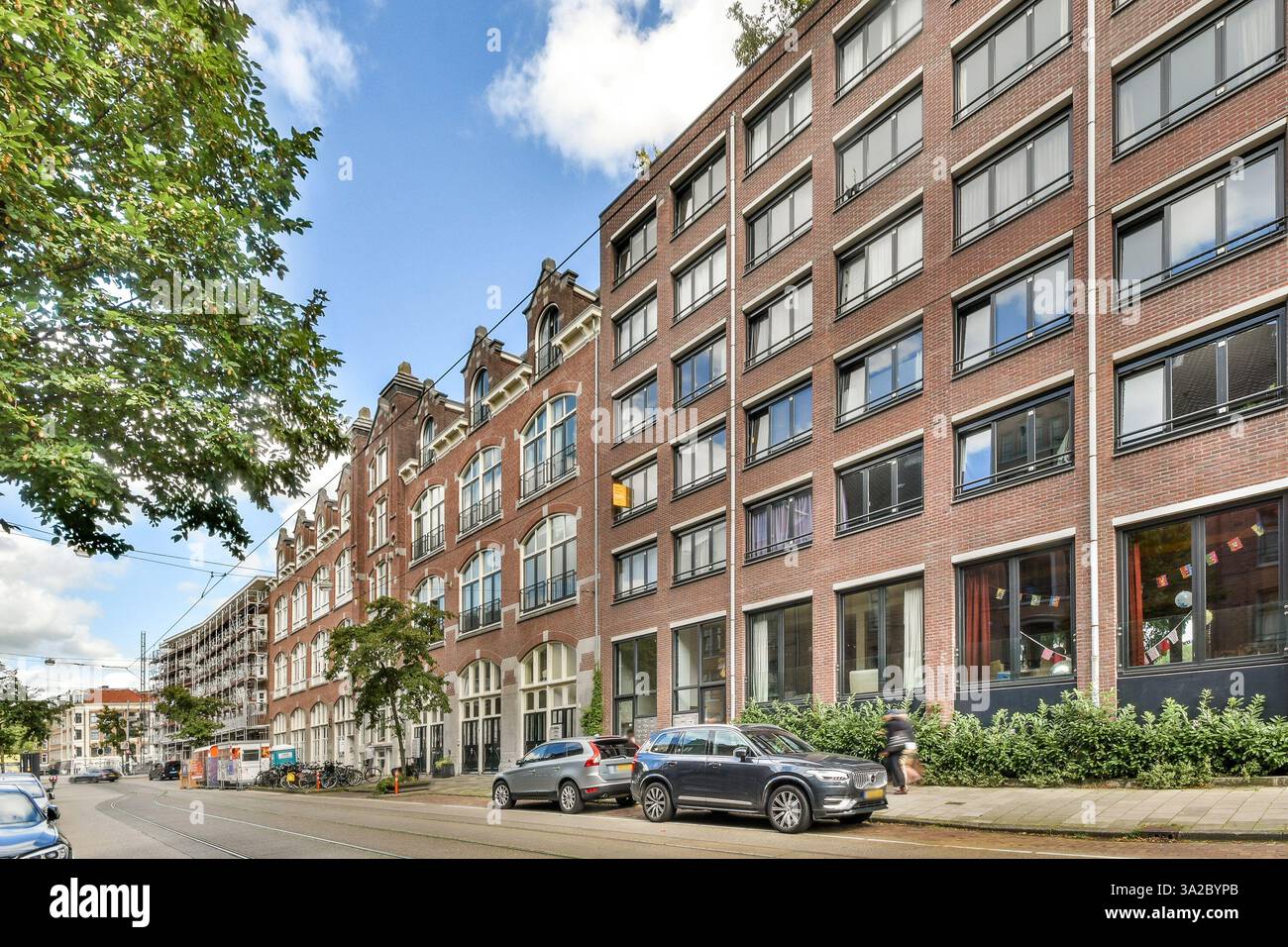 A picturesque street scene featuring modern buildings alongside ...