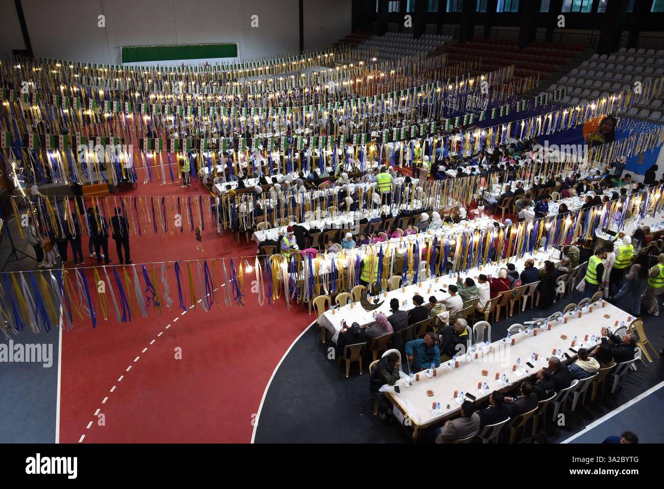 Damascus, Syria. 12th Mar, 2025. Orphans gather for an iftar dinner ...