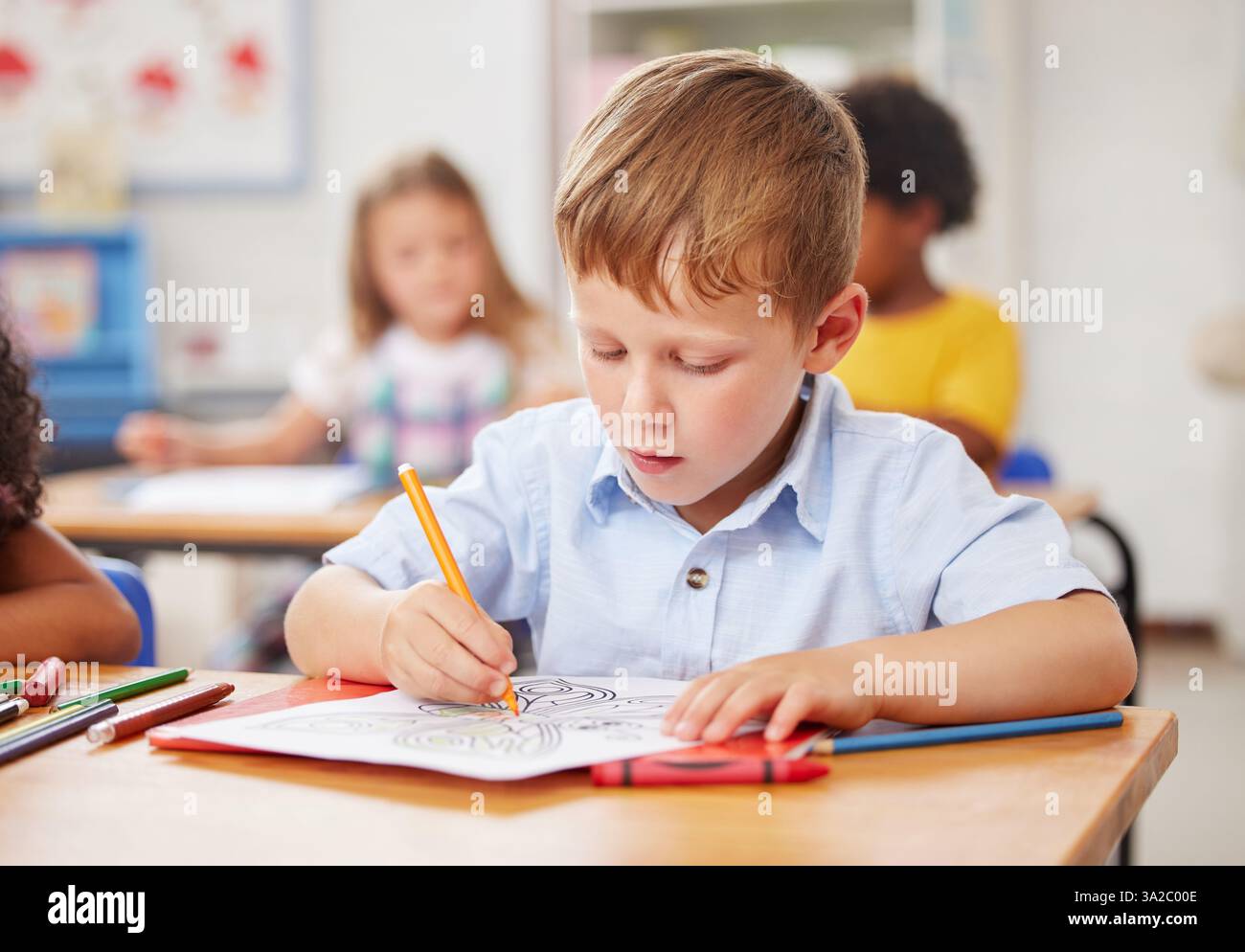 Boy child, school and coloring in classroom for creative test ...