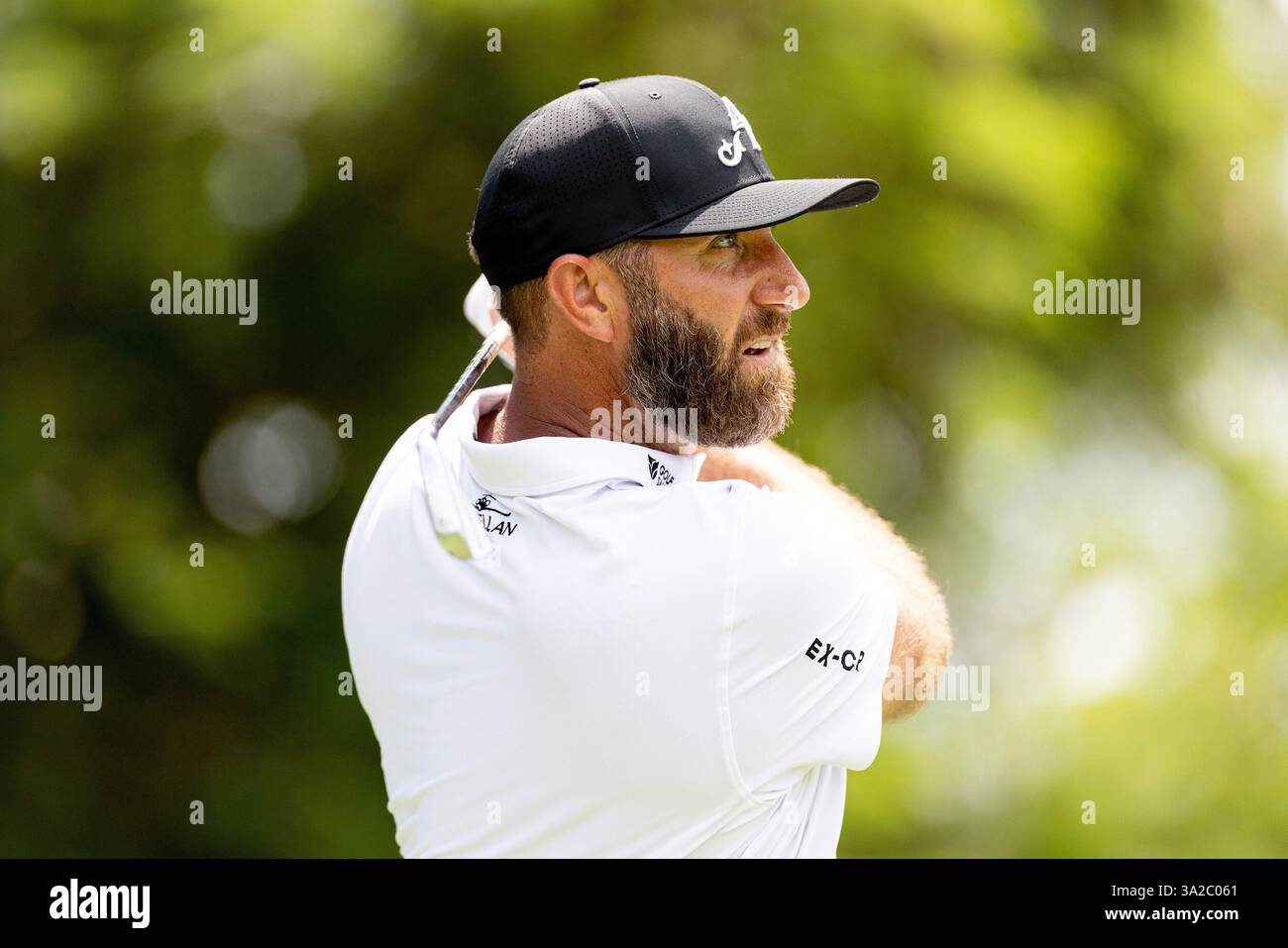 Captain Dustin Johnson of 4Aces GC hits his shot from the eighth tee ...