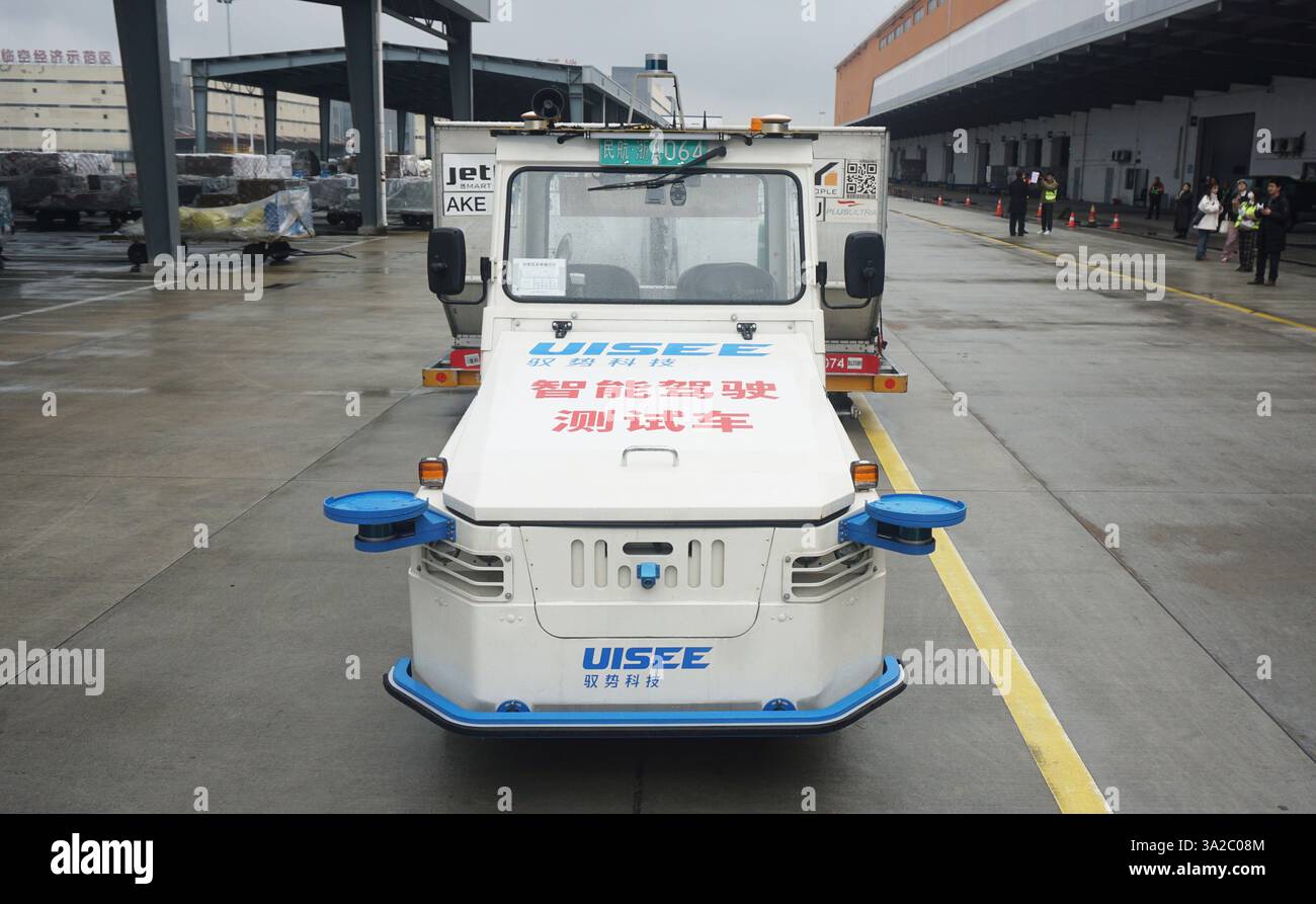 HANGZHOU, CHINA - MARCH 13, 2025 - A driverless cargo tractor is put ...