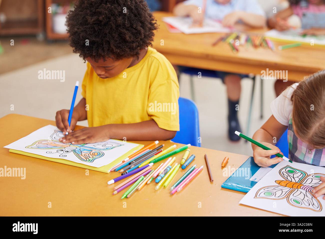 School, students and coloring on paper in classroom for creative ...