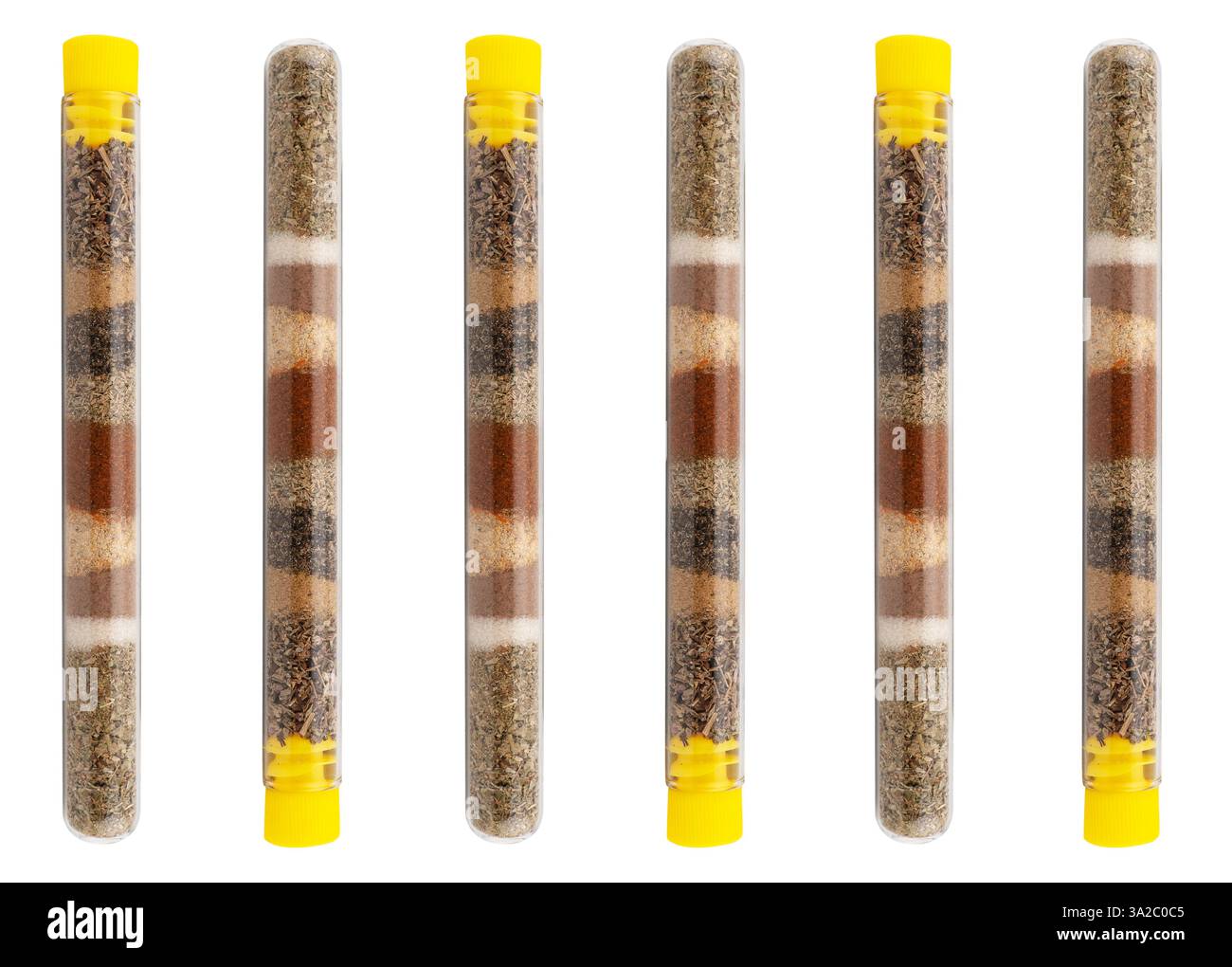 Detail spices in spice rack. Kitchen spices in glass jar. Colored ...