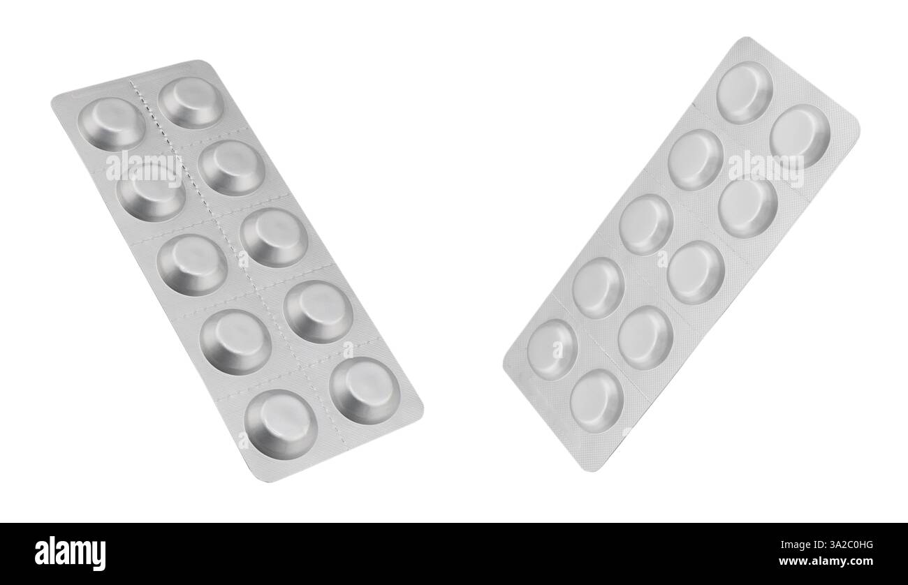 Macro shot pile of tablets pill in silver blister packaging isolated on ...