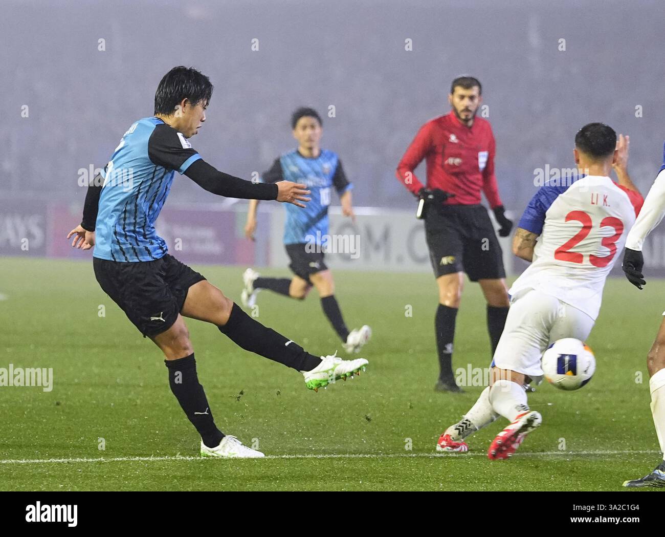 Asahi Sasaki (L) of Kawasaki Frontale opens the scoring in the first half of an AFC Champions ...