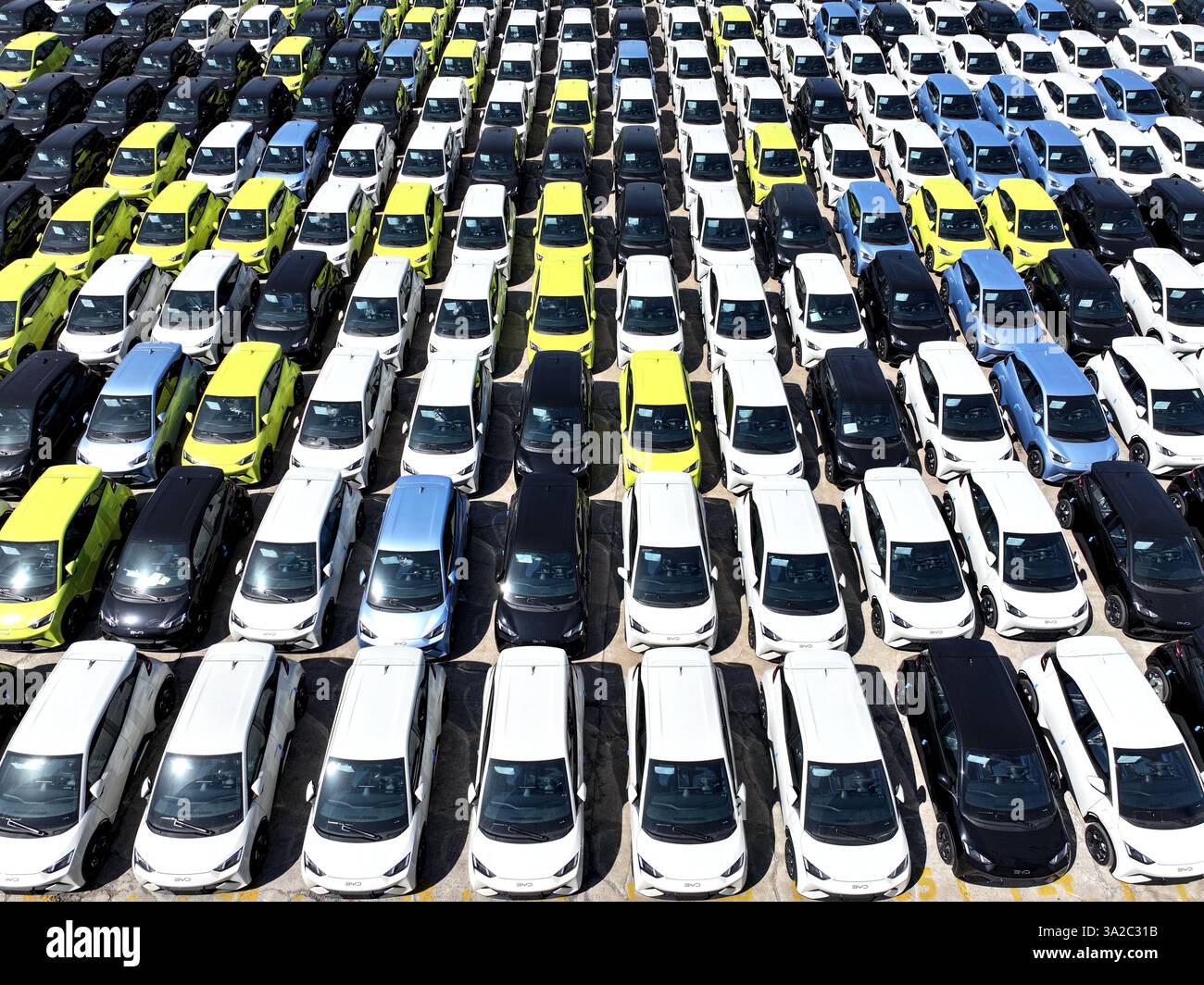 LIANYUNGANG, CHINA - MARCH 13, 2025 - Cars are loaded for export at the ...