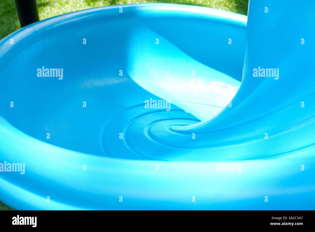 clean blue slide in colorful children's playground during the day Stock ...