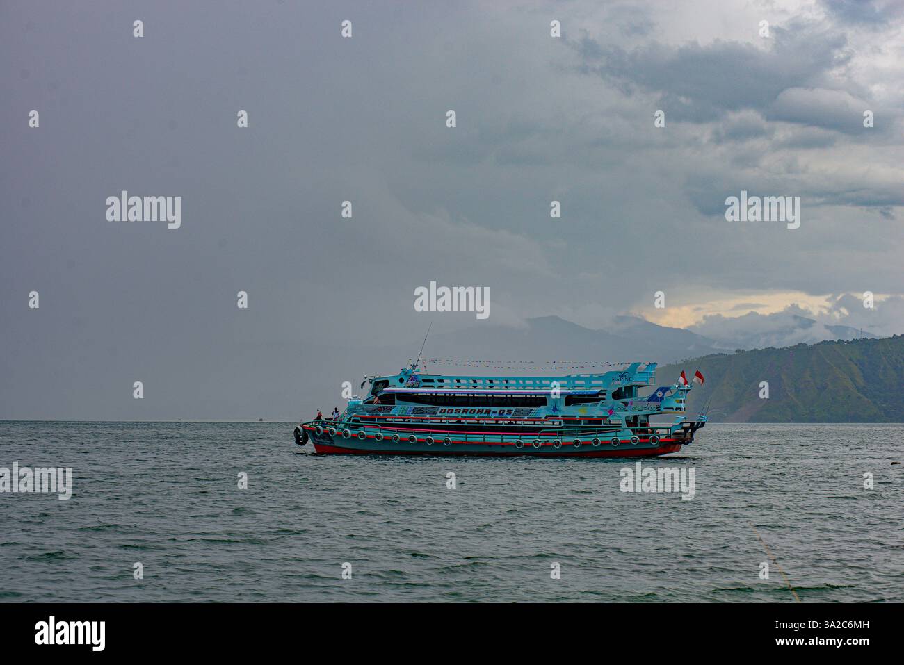 Traditional wooden ferry as water transportation in Lake Toba Stock ...