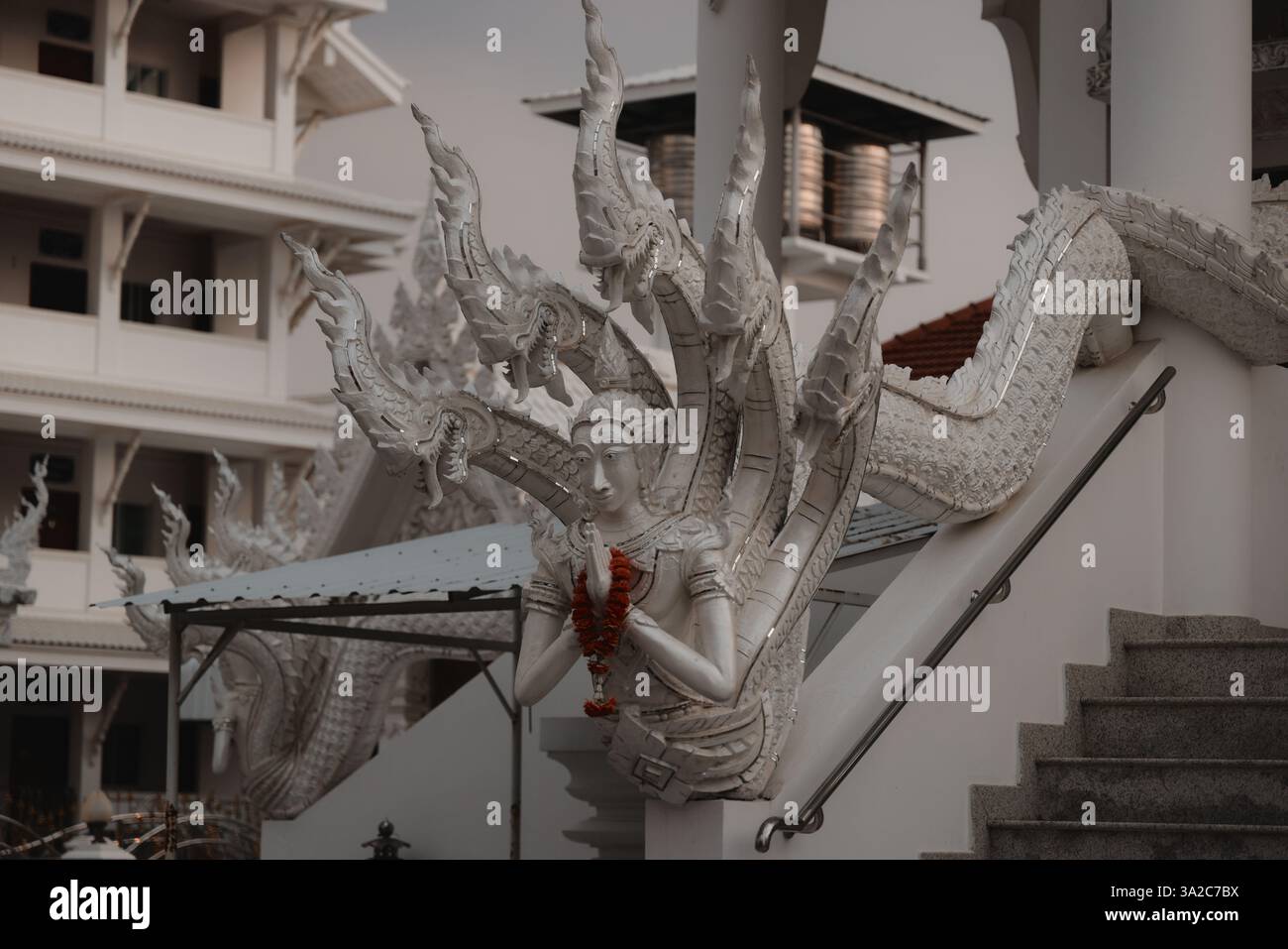 An Exquisite and Elegant White Serpent Sculpture Gracefully Positioned ...