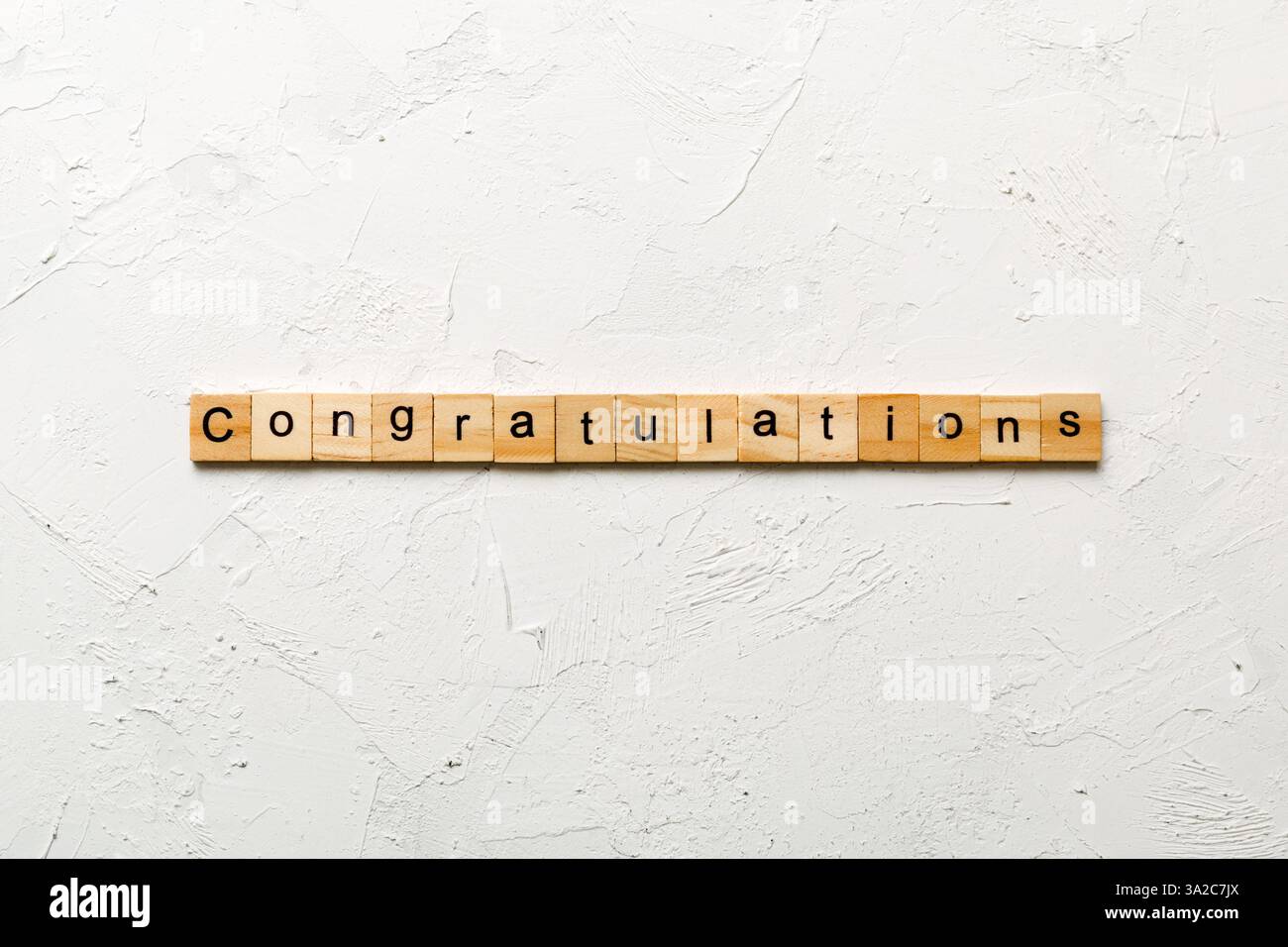 congratulations word written on wood block. congratulations text on ...