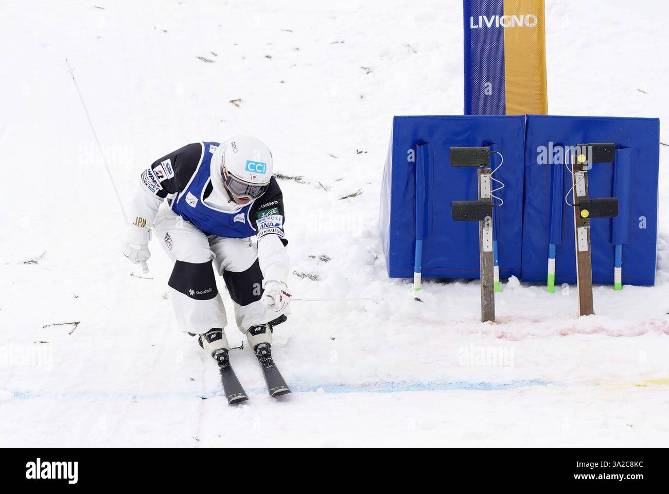 Japanese freestyle skier Ikuma Horishima crosses the finish line in the ...
