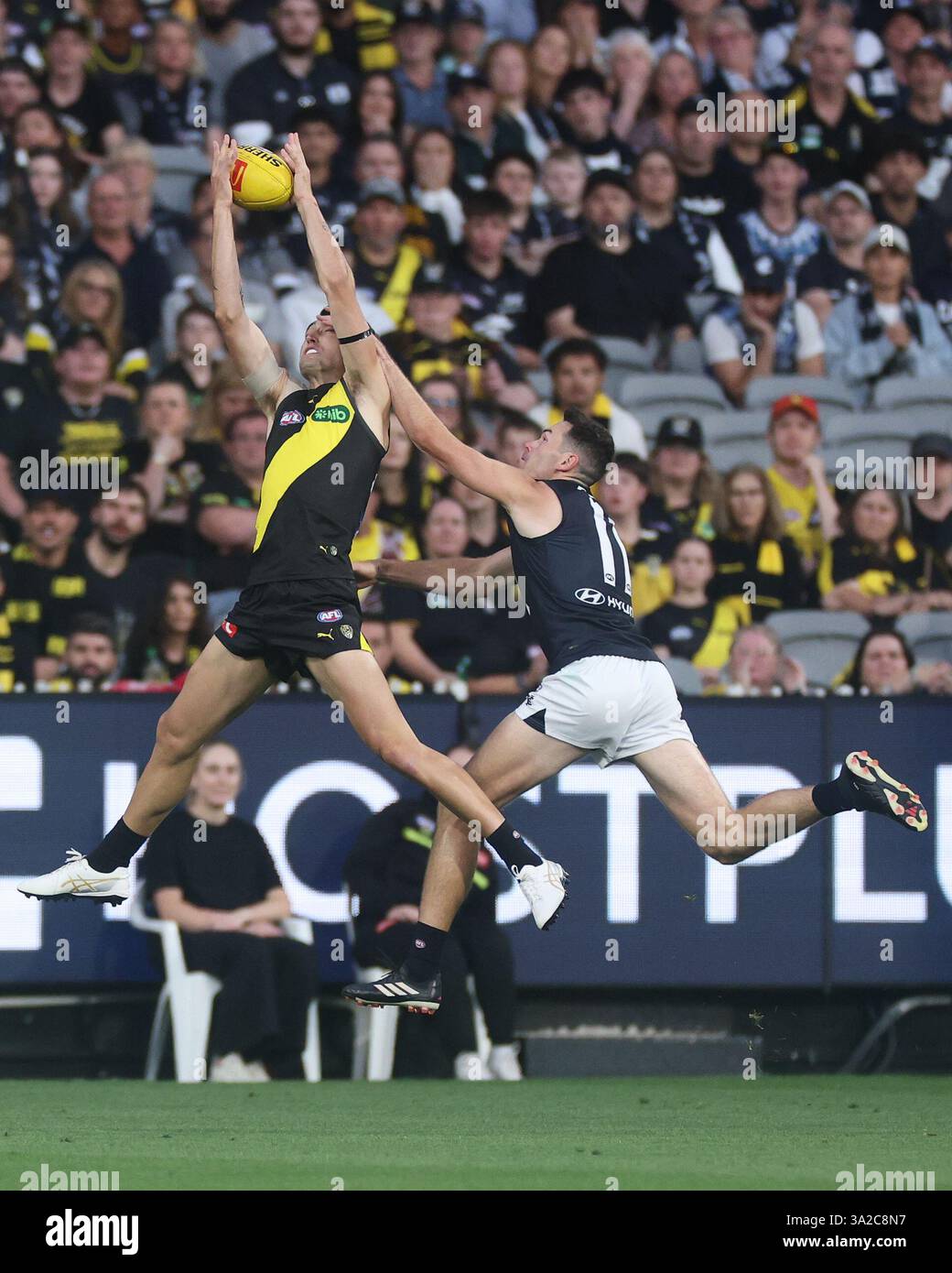 Jacob Bauer of the Tigers marks the ball during the AFL Round 1 match ...