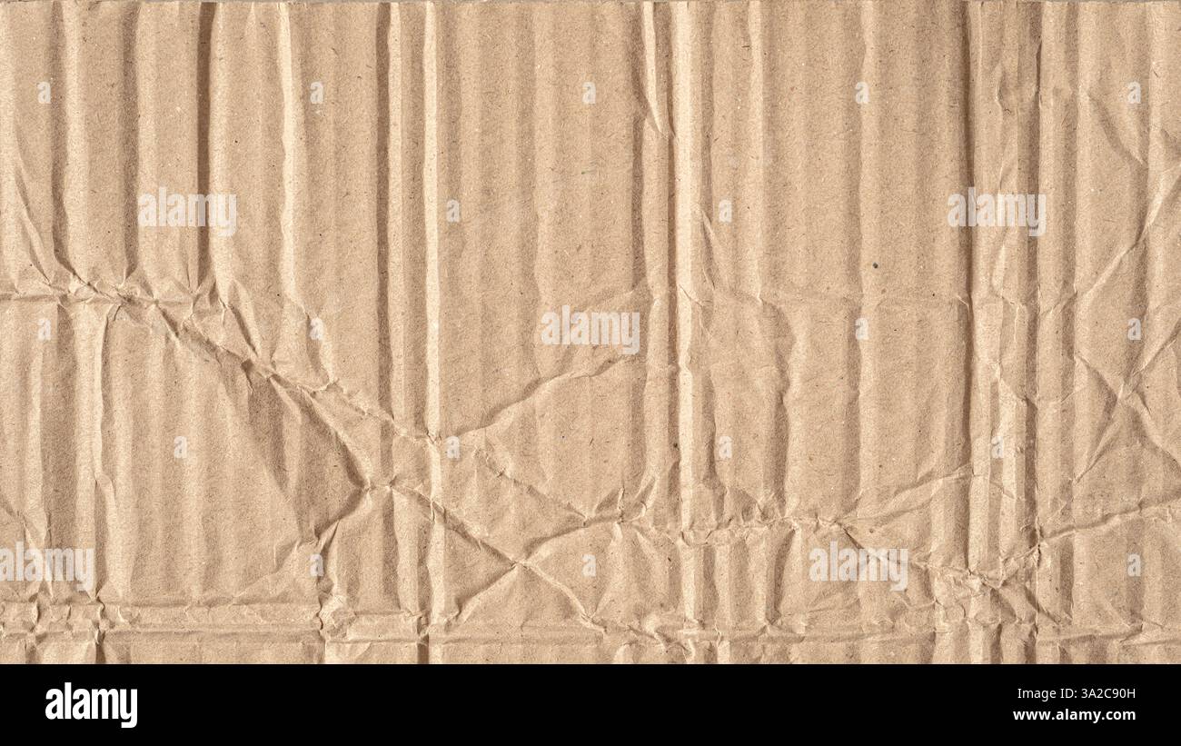 Textured brown cardboard with creases and folds creates an packaging ...