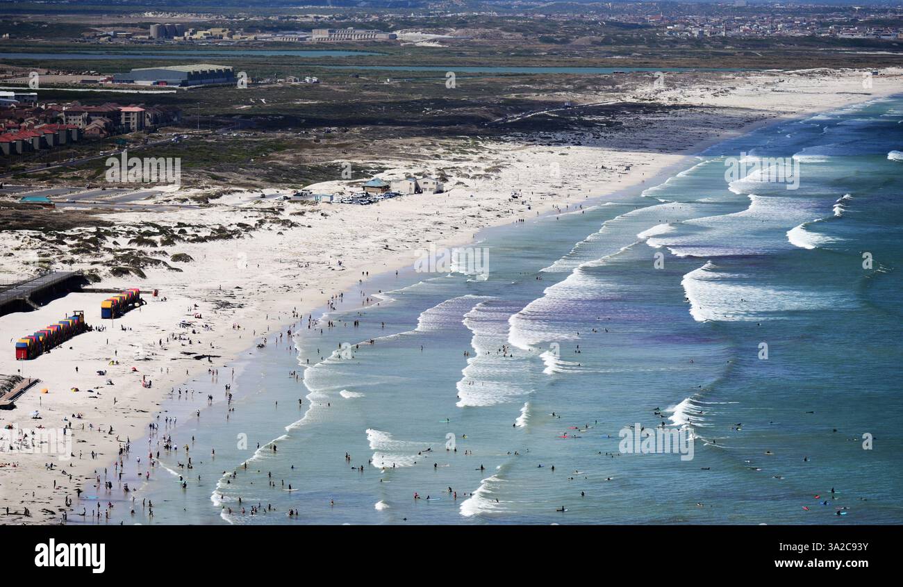 Aerial view of people enjoying a summer Sunday on Muizenberg beach ...