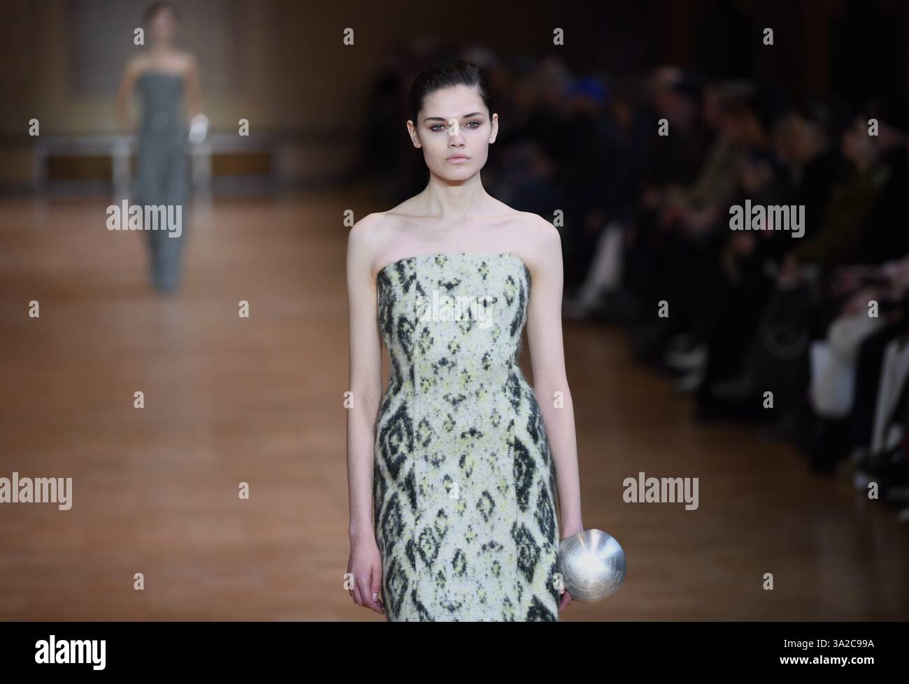 Paris, France.11th March 2025. The timeless elegance of Li brocade ...