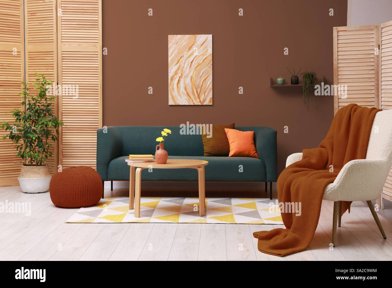 Stylish living room with elements in mocha mousse shade. Interior ...