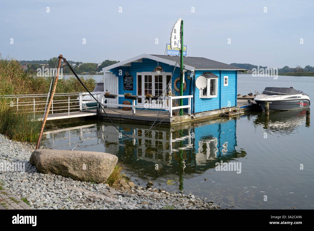 Hut for boat hire at the Peene river Stock Photo - Alamy