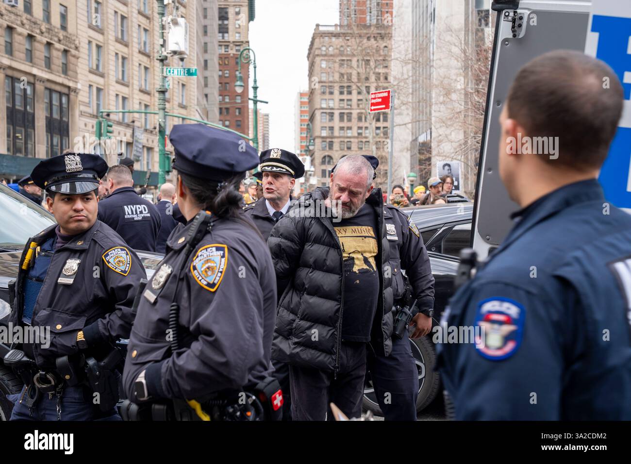 New York, United States. 12th Mar, 2025. NYPD officers arrest a ...