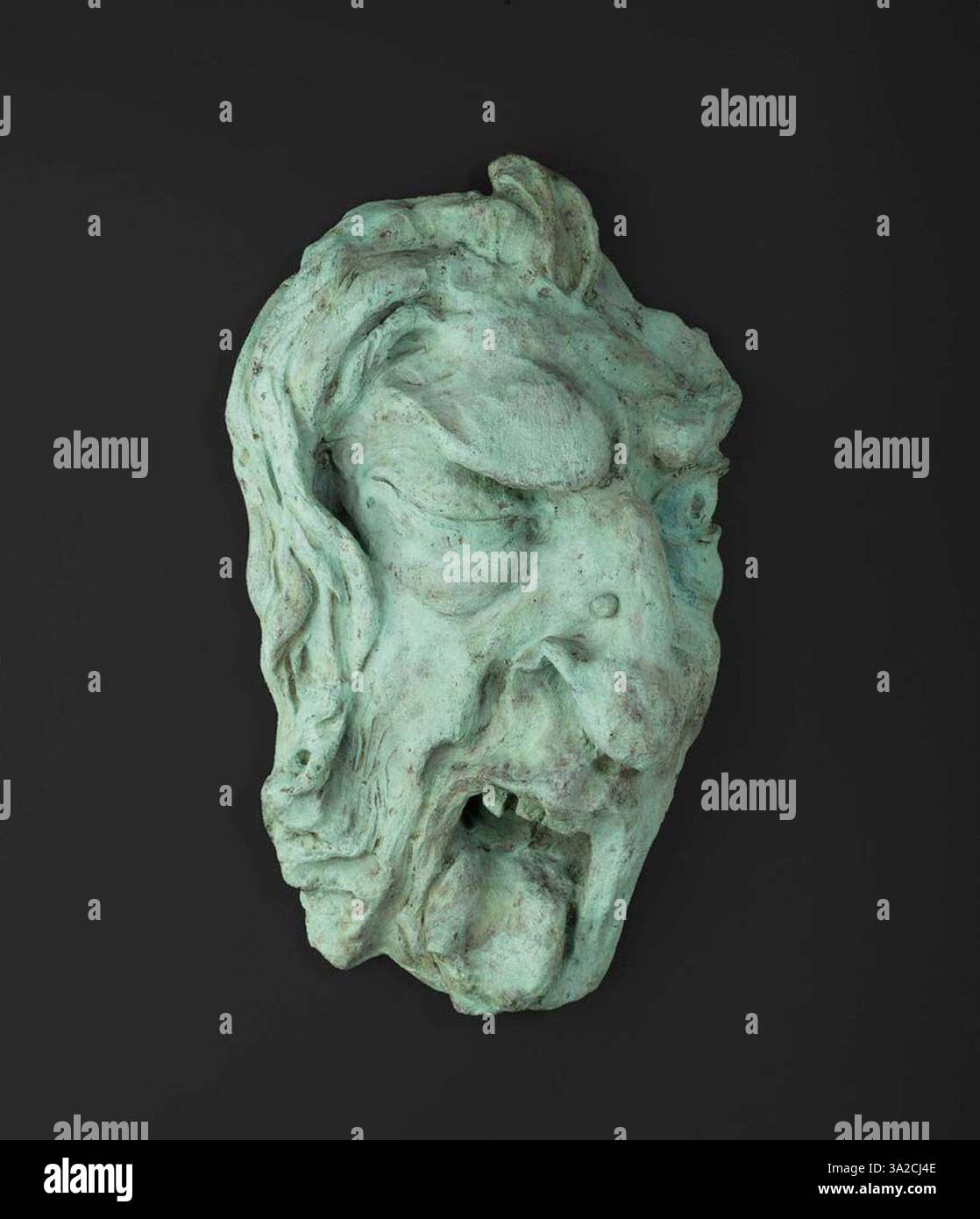 This collection of five bronze casts from plaster masks of Arnold ...