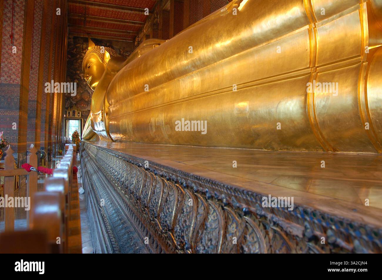 The Reclining Buddha at Wat Pho, Bangkok. This massive golden statue ...