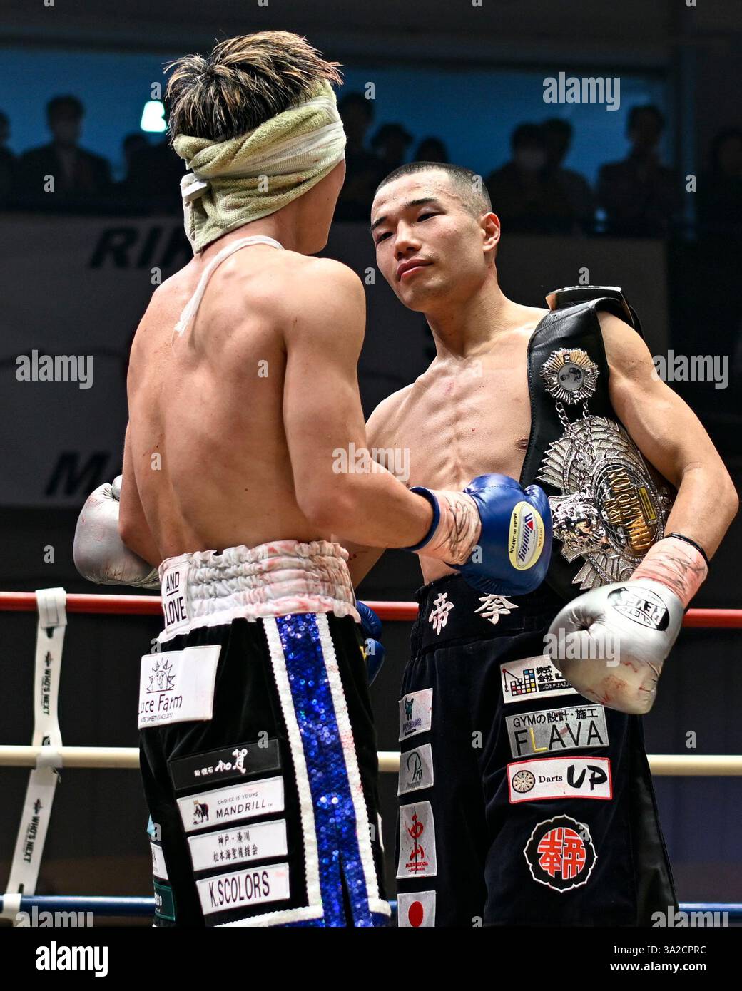 Champion Riku Masuda, right, and challenger Kaisei Matsumoto give respect to each other after ...