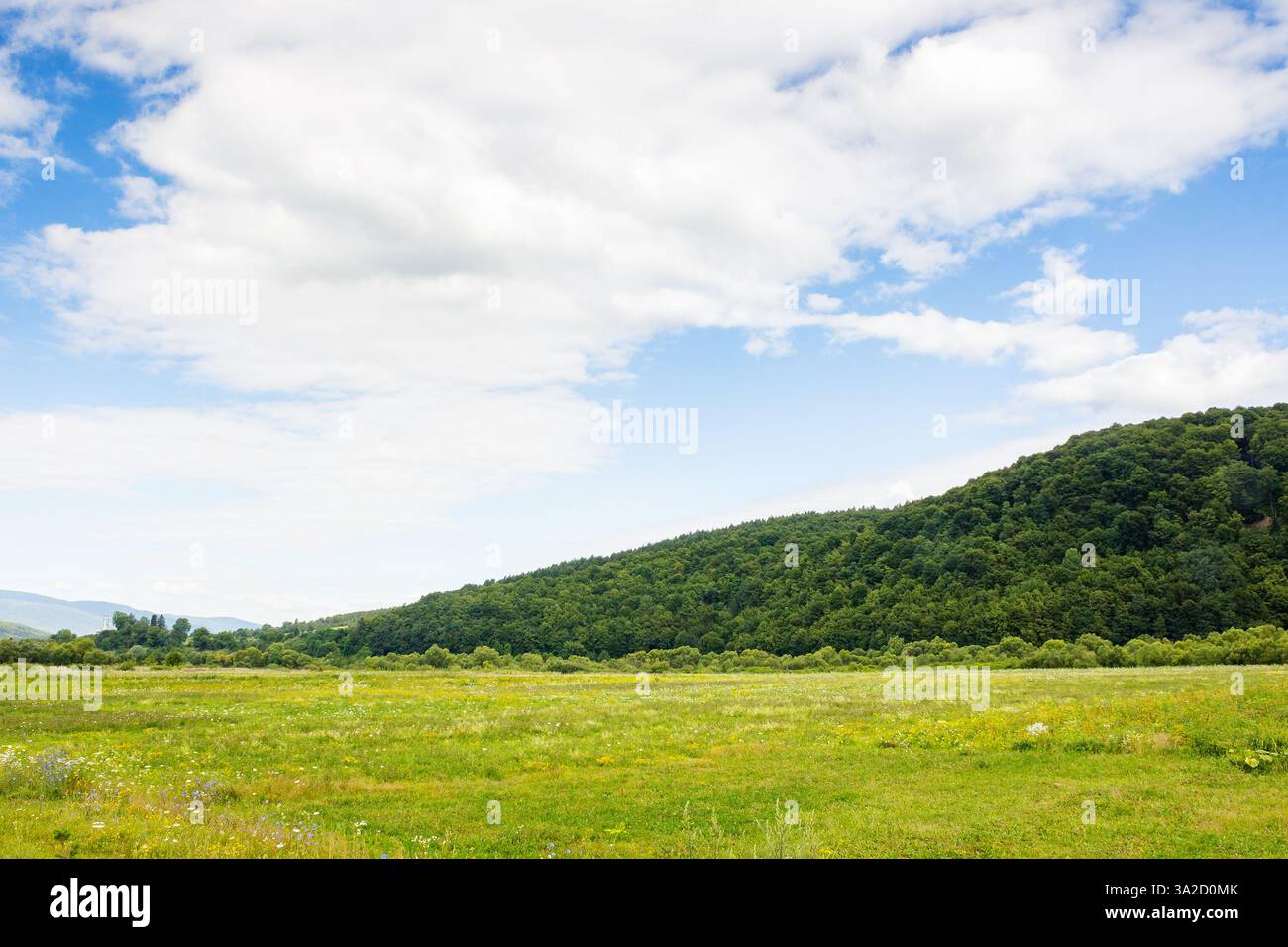 countryside landscape with field near the hill. rural outdoor adventure ...
