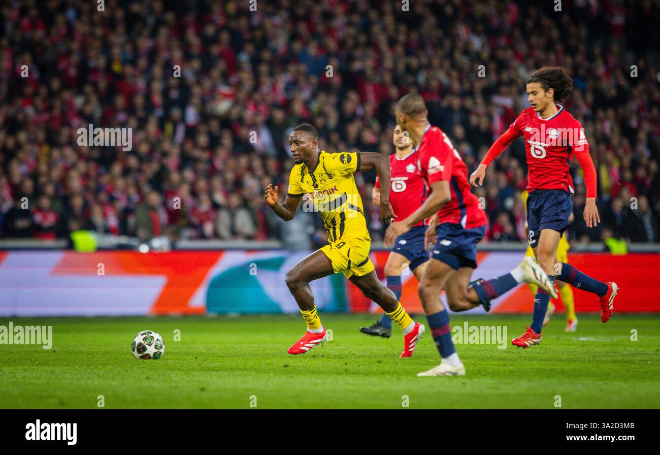 Lille, Germany. 12th Mar 2025. Serhou Guirassy (BvB) Ayyoub Bouaddi ...
