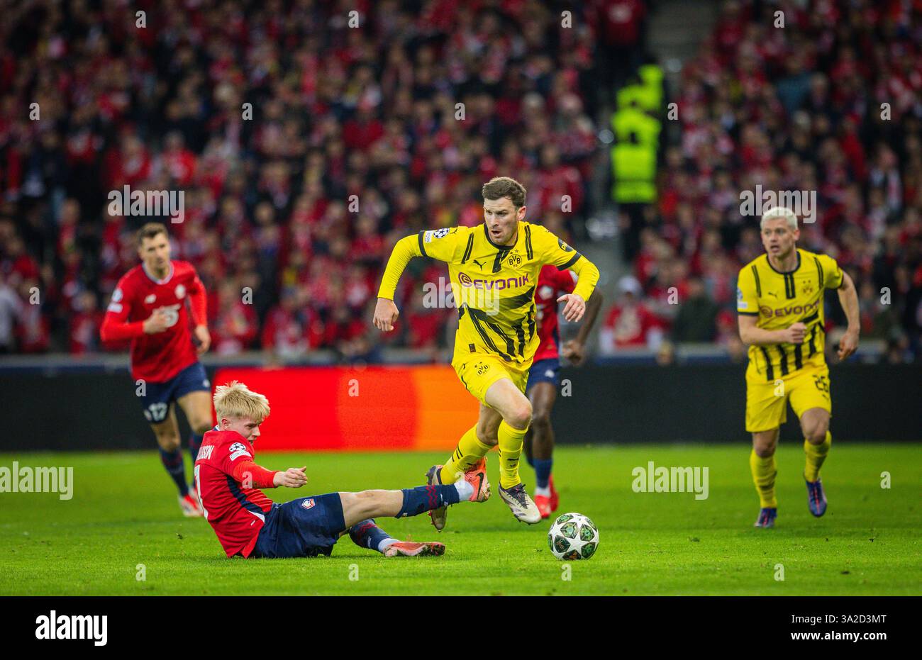 Lille, Germany. 12th Mar 2025. Hakon Haraldsson (Lille) Pascal Gross ...