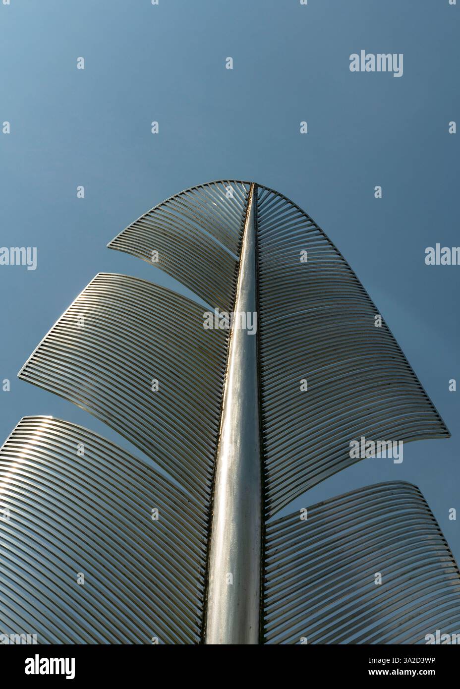 Stainless steel feather against blue sky as detail from The Kindred ...