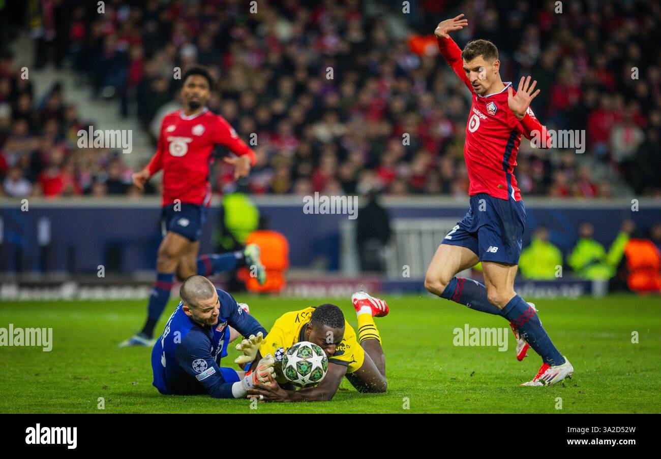 Lille, Germany. 12th Mar 2025. Lucas Chevalier (Lille) Serhou Guirassy ...