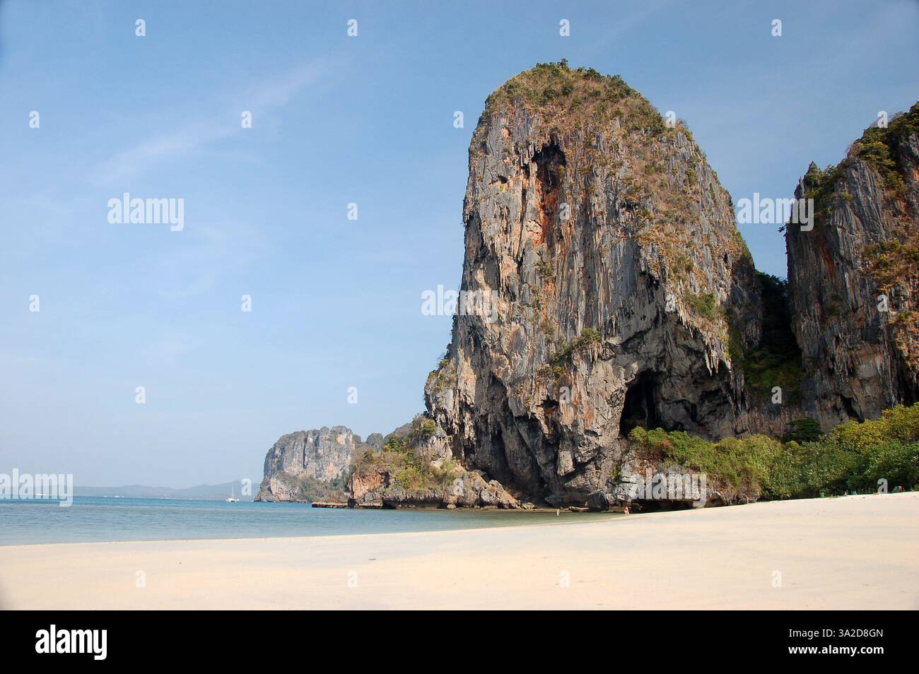 Limestone karst islands of Hong Island rise from the turquoise waters ...