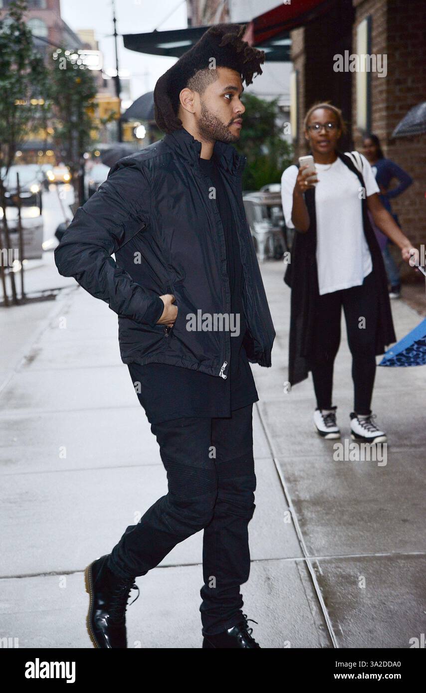 Canadian singer The Weeknd arrives at a downtown hotel on September 10 ...