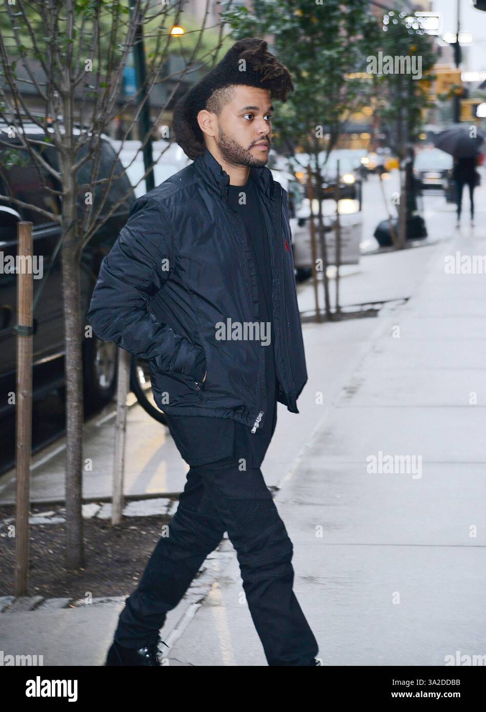Canadian singer The Weeknd arrives at a downtown hotel on September 10 ...